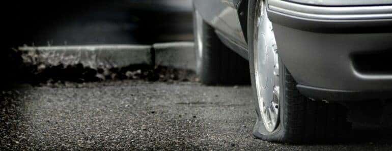 What to do if you get a flat tire while driving | Carl Black Auto ...